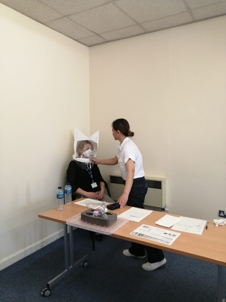 SaTH training external healthcare professionals on how to fit face ...